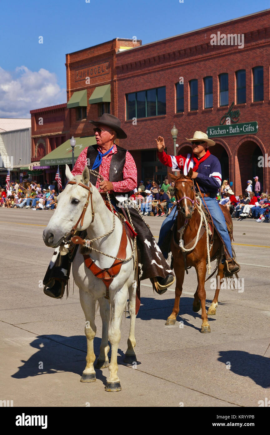 Cody, Wyoming, USA - July 4th, 2009 - Two riders greet the spectators ...