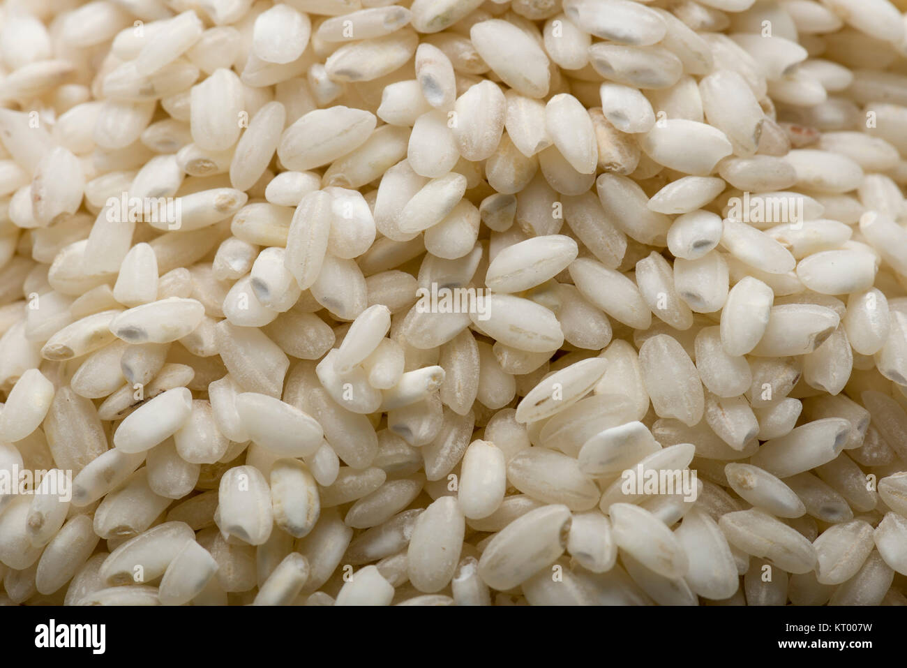 heap of white rice, closeup Stock Photo - Alamy