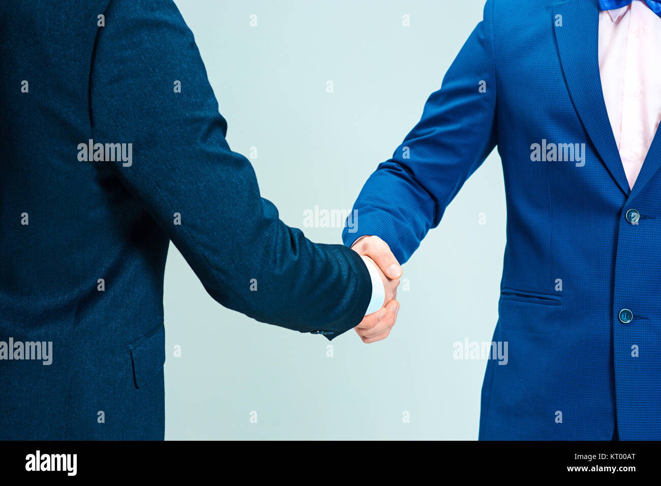 handshake isolated on gray Stock Photo - Alamy