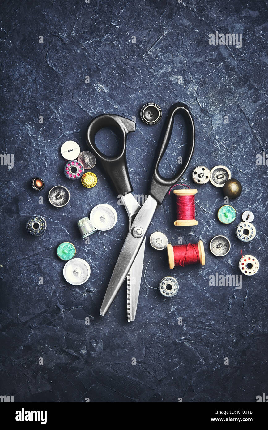 scissors and buttons Stock Photo - Alamy