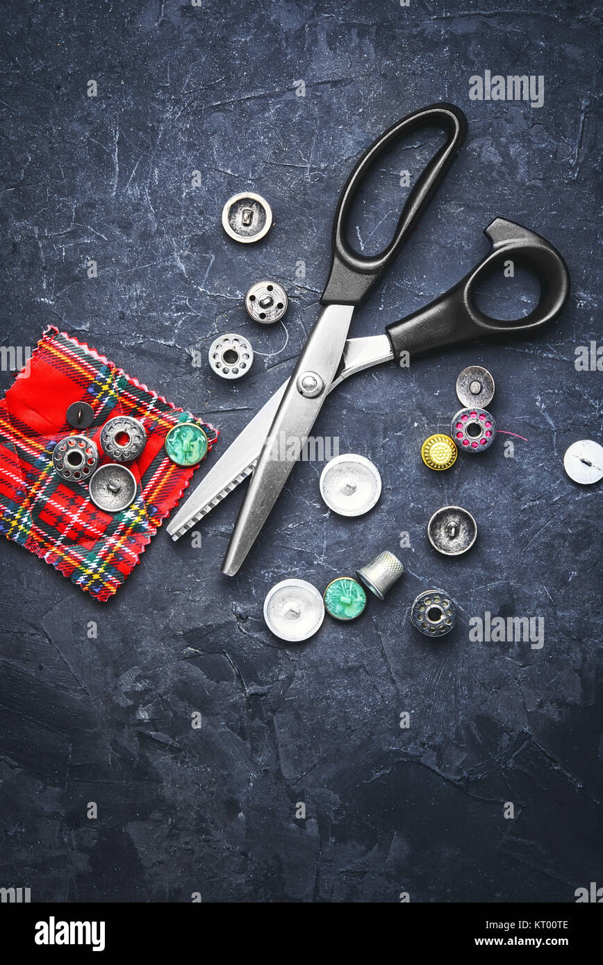 professional scissors for fabric and buttons from clothing Stock Photo ...