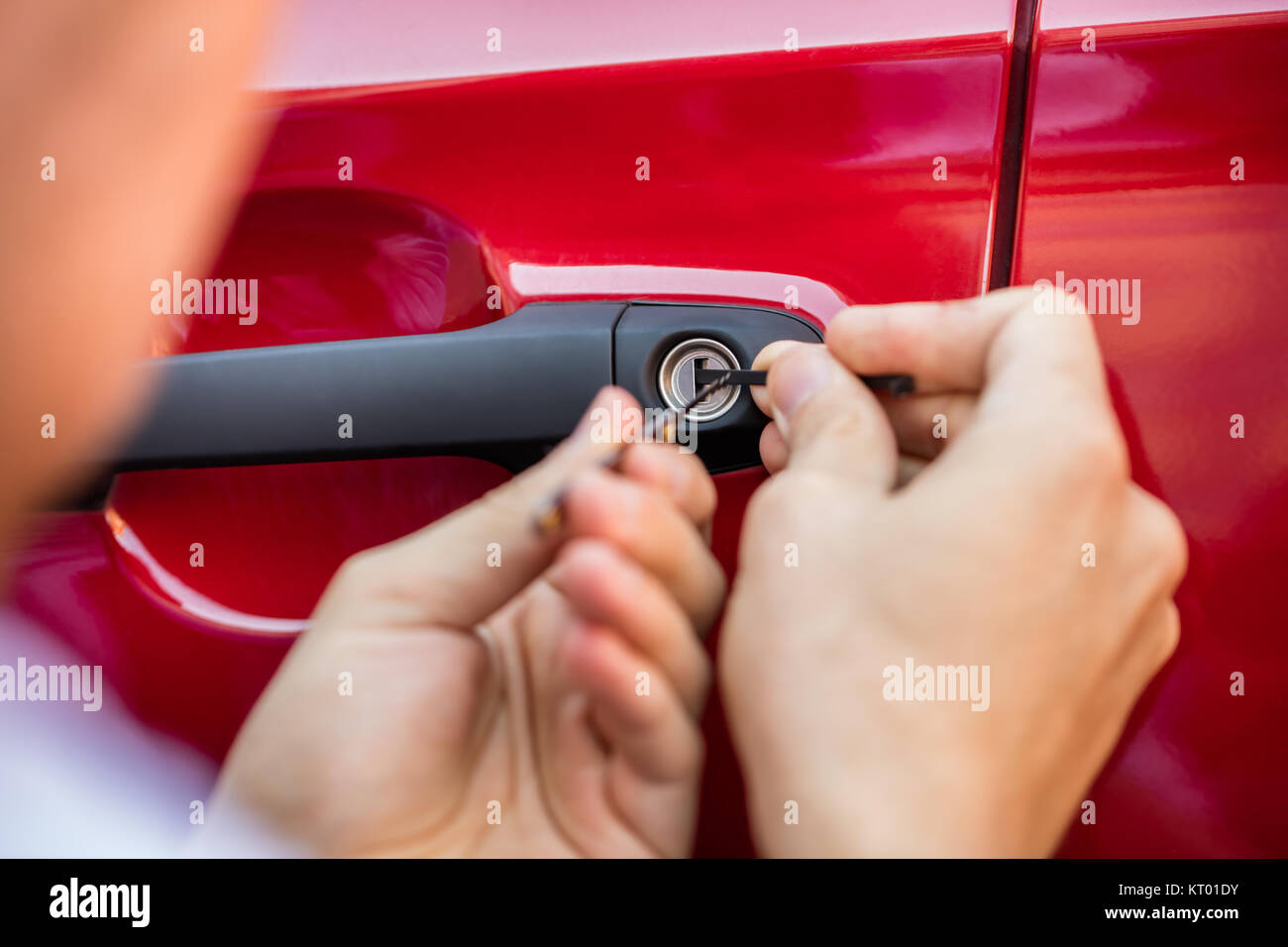 Person Opening Car Door With Lockpicker Stock Photo - Alamy
