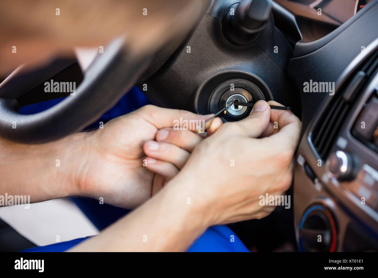 Person Inserting Tool In Key Hole Stock Photo - Alamy