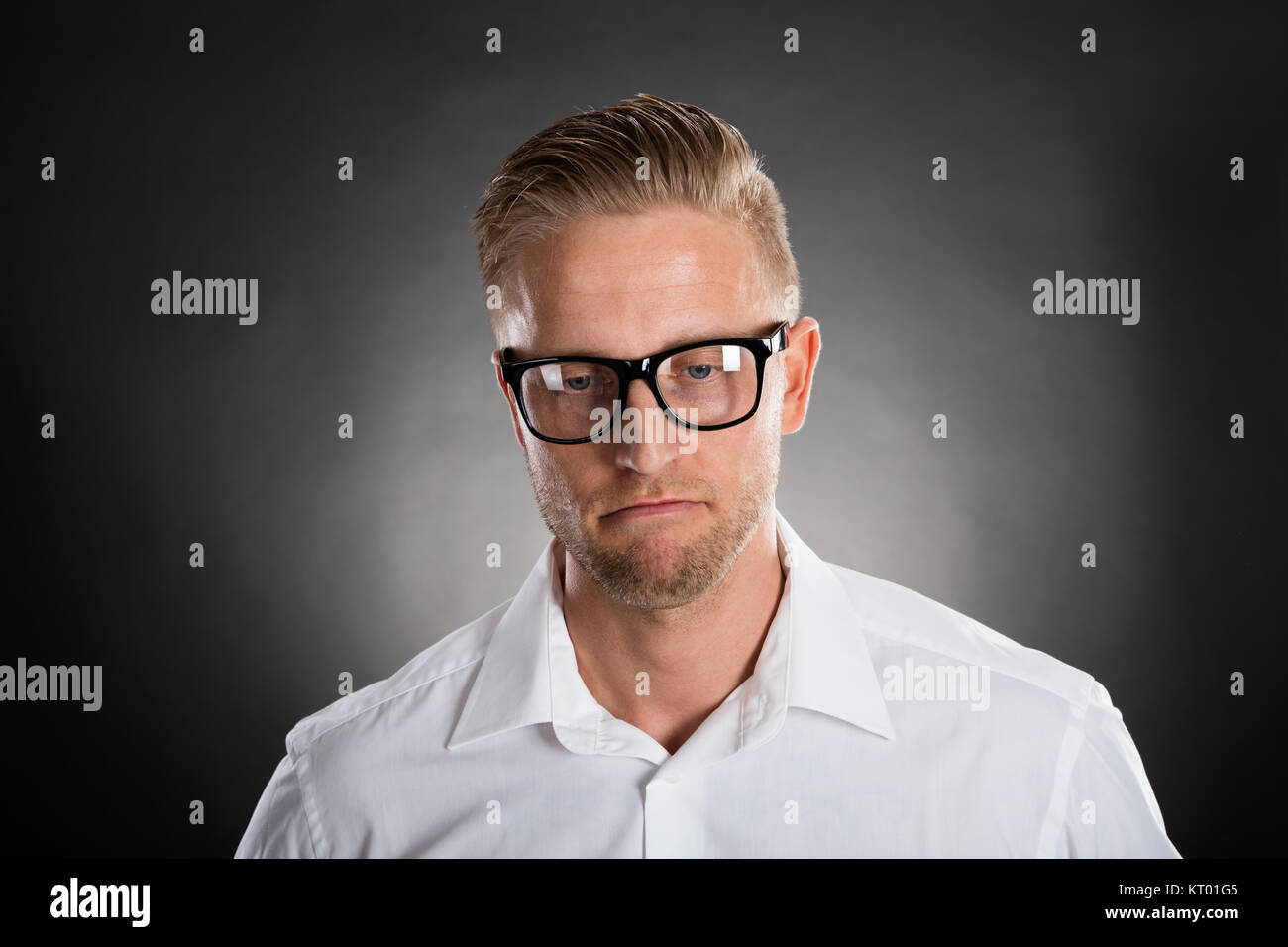 Portrait sad guy wearing hi-res stock photography and images - Alamy
