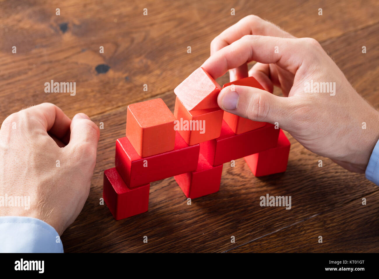 Person Building Blocks Stock Photo - Alamy