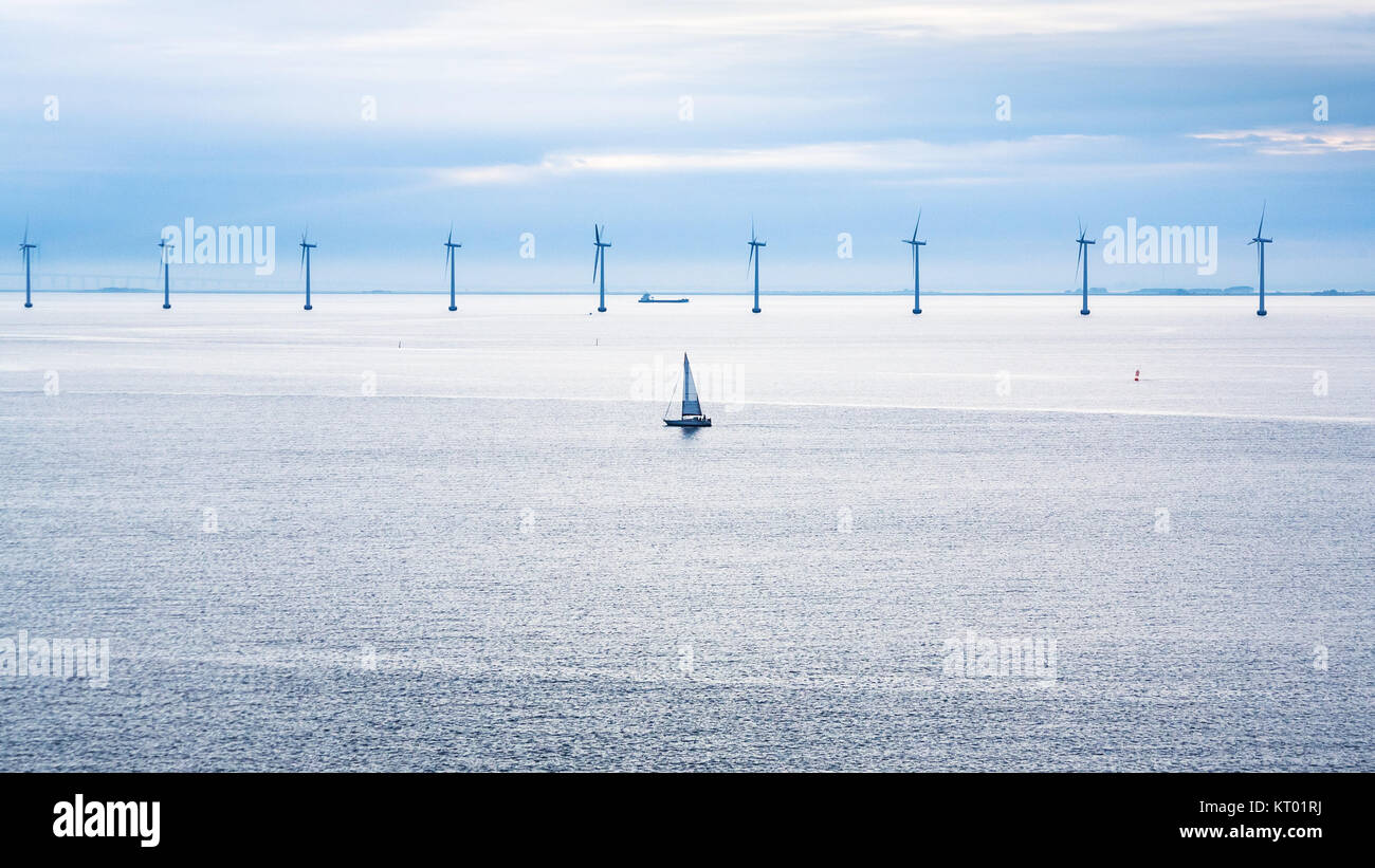 boat and ship near offshore wind farm in morning Stock Photo - Alamy