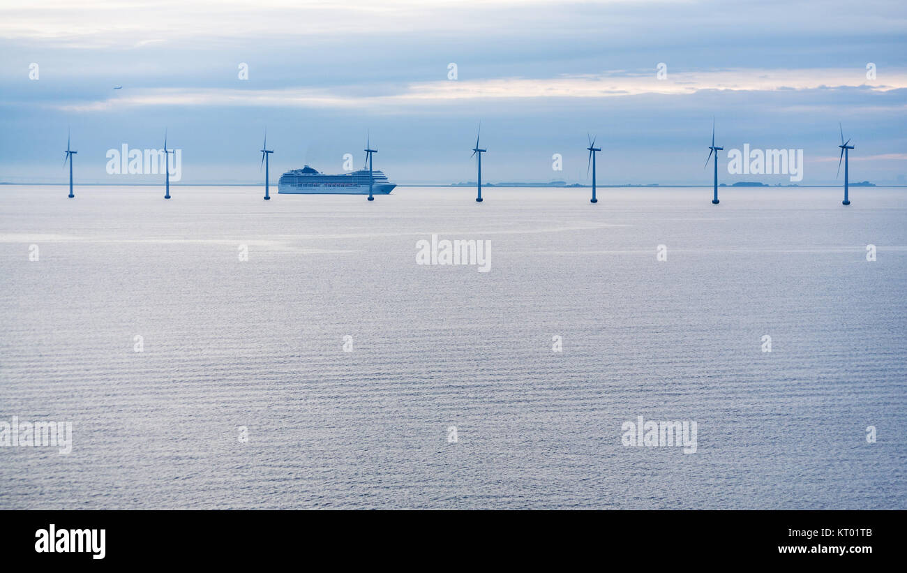 ferry near offshore wind farm in morning twilight Stock Photo - Alamy