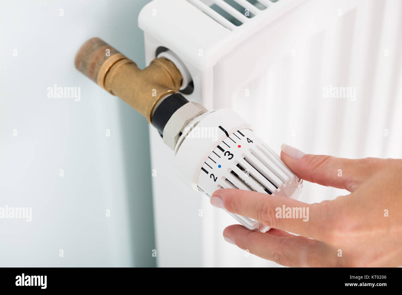 Person Adjusting Thermostat Radiator Valve Stock Photo - Alamy