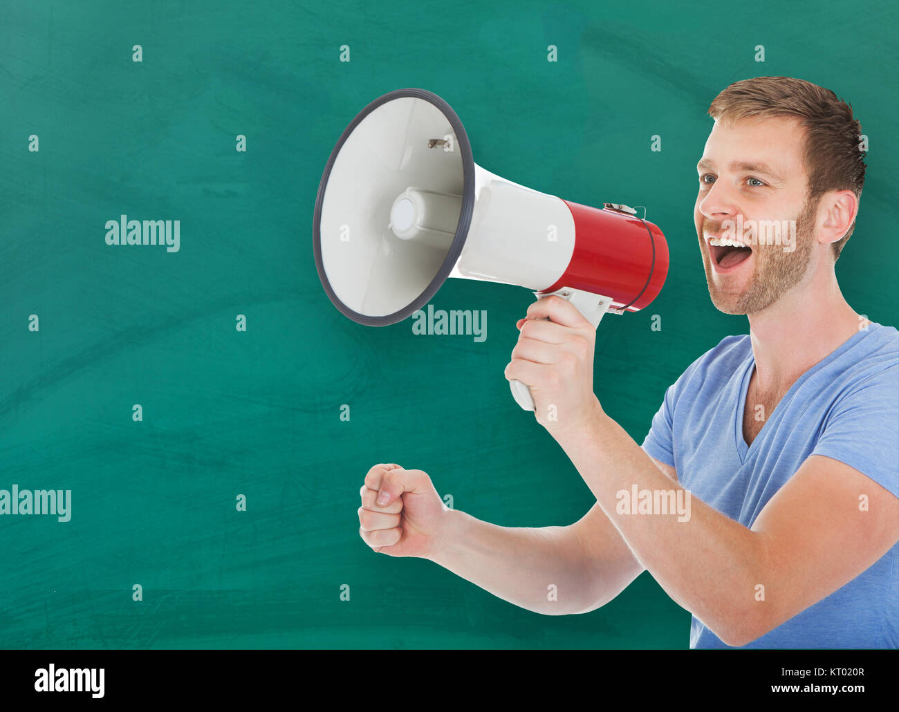 Man Announcing On Megaphone In Classroom Stock Photo - Alamy