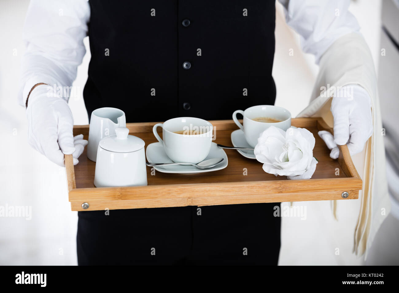 Waiter Carrying Coffee Set Stock Photo - Alamy