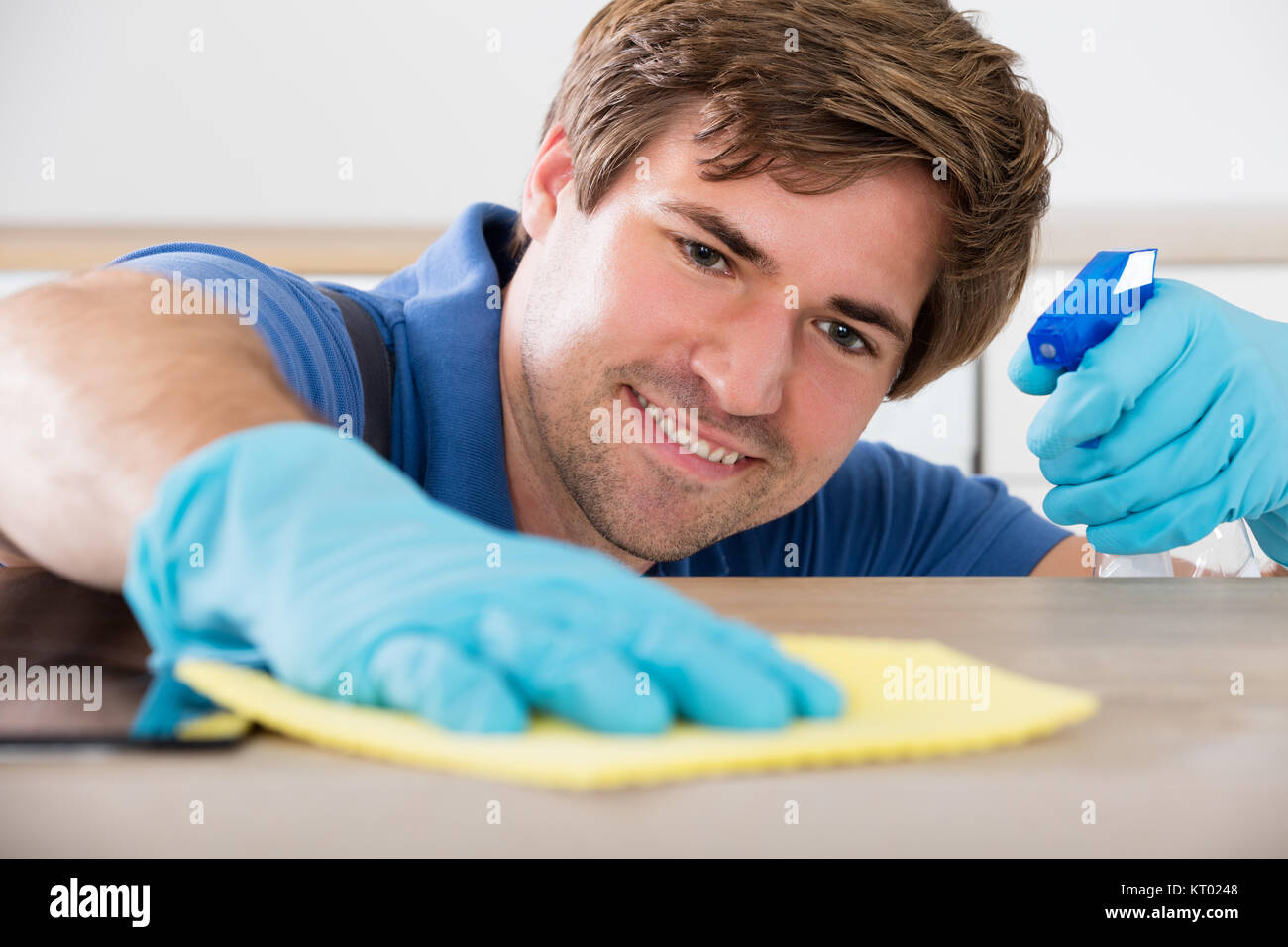 Workers Hand Cleaning Countertop Stock Photo - Alamy