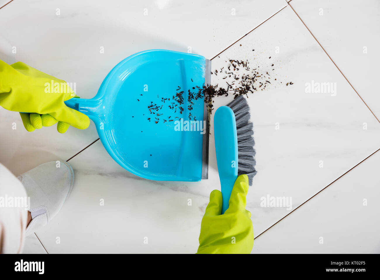 Person Sweeping Floor With Broom And Dustpan Stock Photo - Alamy