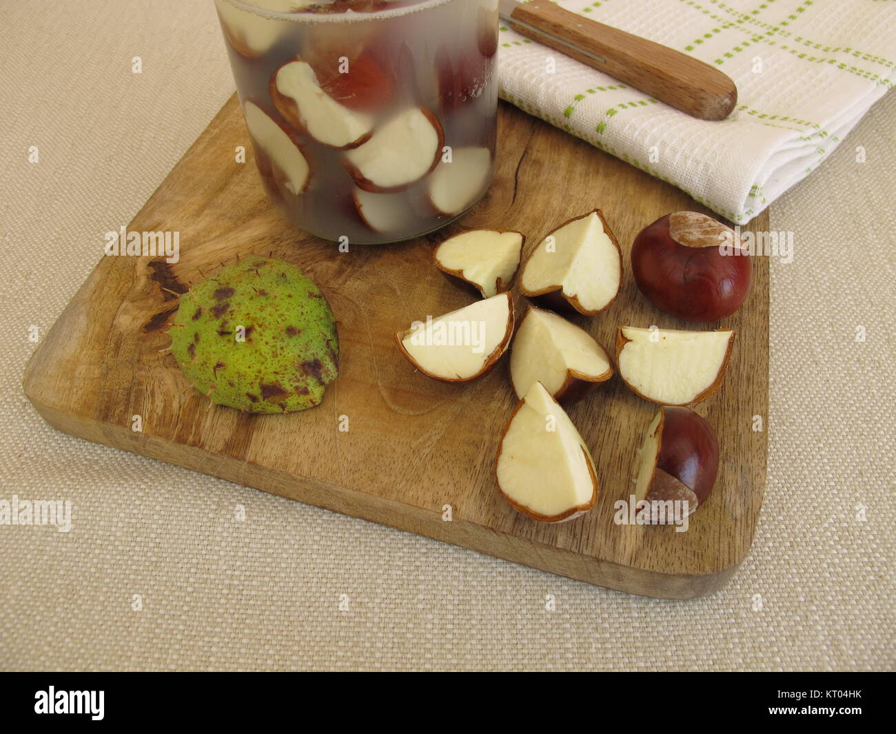 ecological detergent made from chestnuts in the glass Stock Photo - Alamy