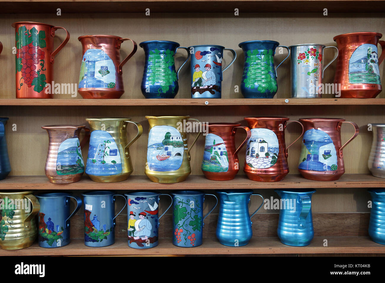 Copper colored traditional Greek jugs Stock Photo - Alamy