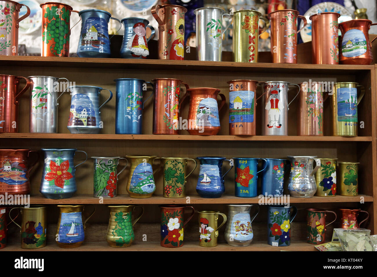 Copper colored traditional Greek jugs Stock Photo - Alamy