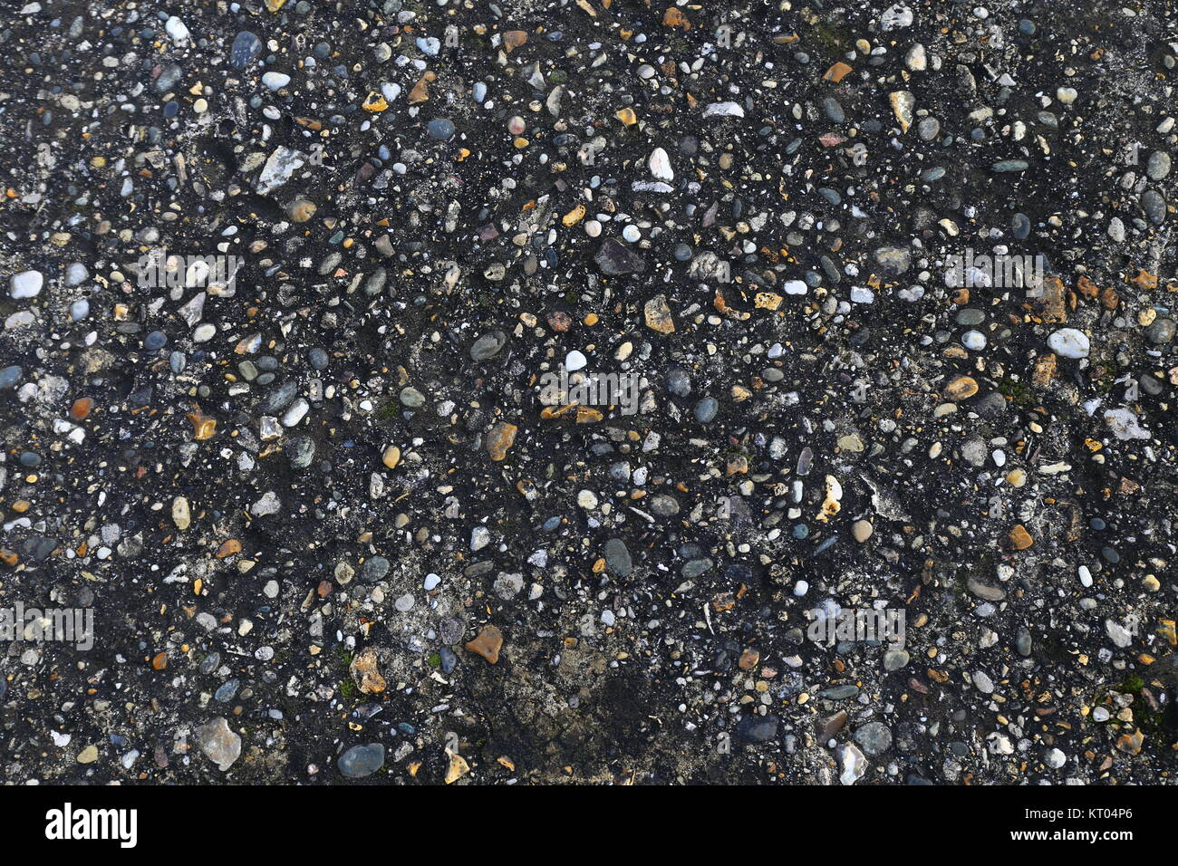 background with dark pebbles Stock Photo - Alamy