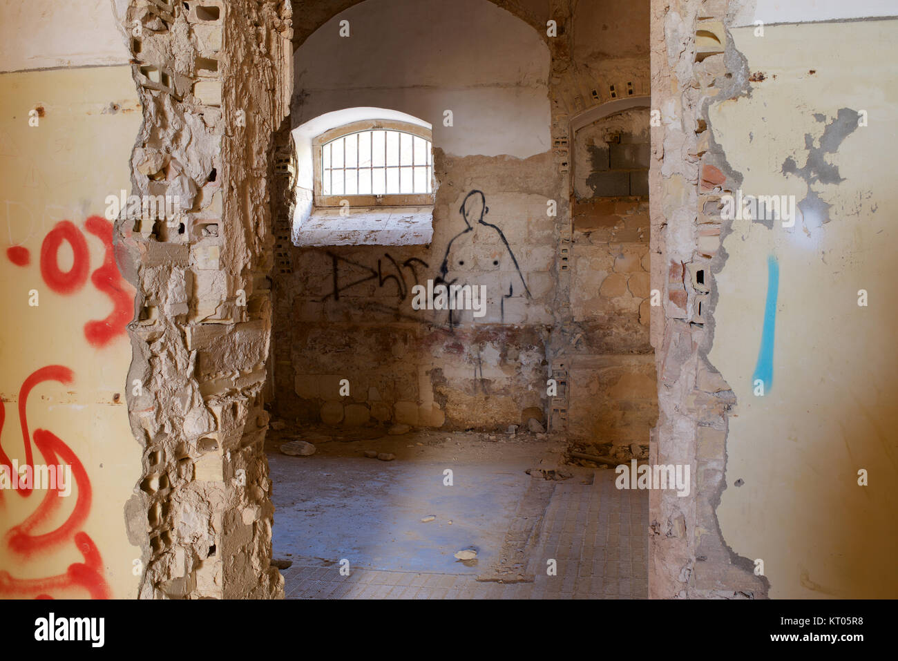 INterior of a large empty building - graffiti on walls Stock Photo - Alamy
