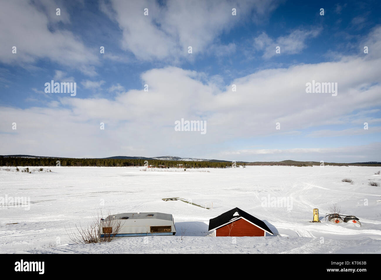 Lake Inari, Landing and jetty, frozen over, Inari, Finland Stock Photo ...