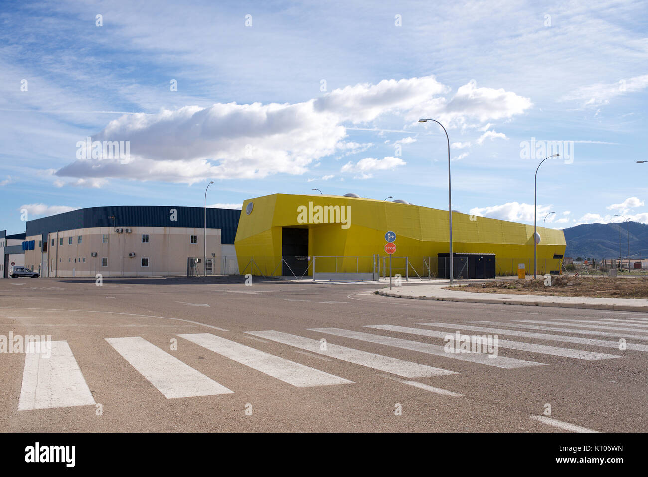 Yellow industrial unit Stock Photo - Alamy