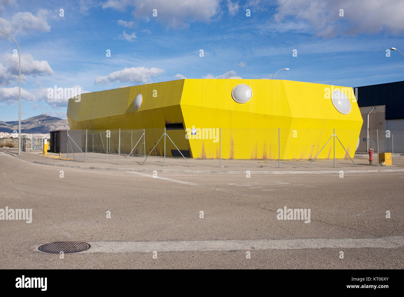 Yellow industrial unit Stock Photo - Alamy