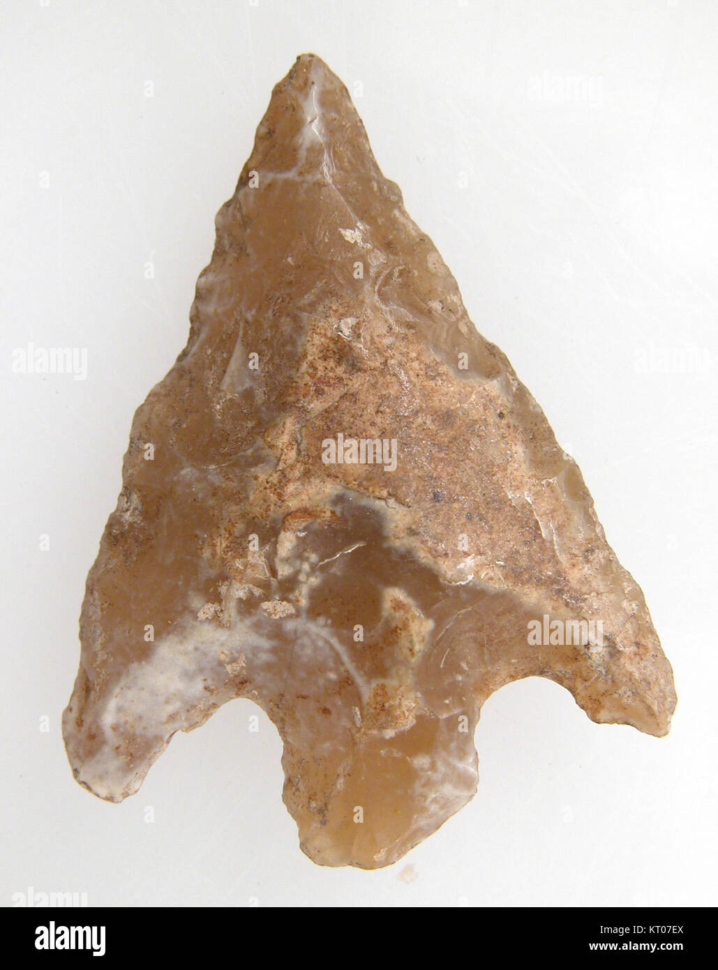 This artifact, identified as an arrowhead, is part of the collection at ...