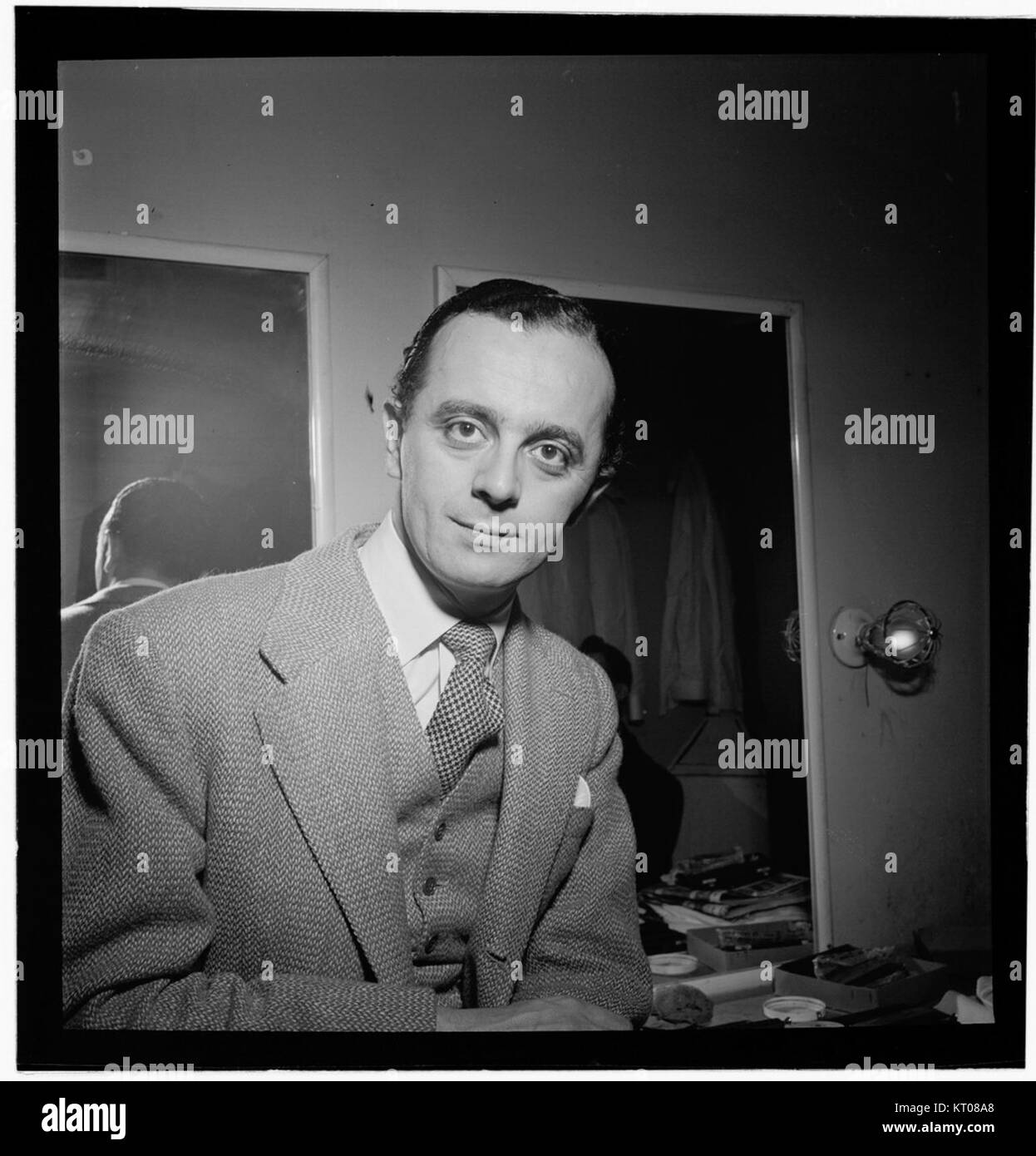 Portrait of Larry Adler at City Center, New York, circa January 1947 Stock Photo - Alamy