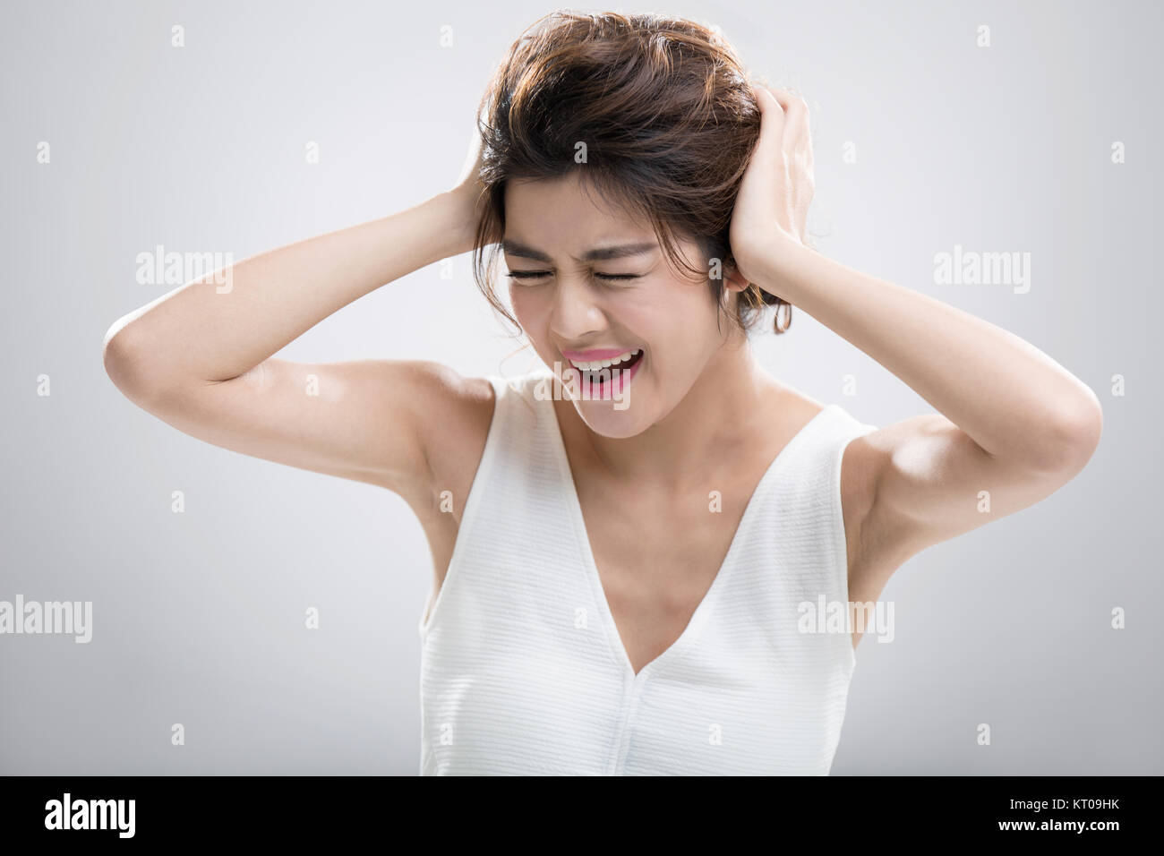 Young woman shouting Stock Photo - Alamy