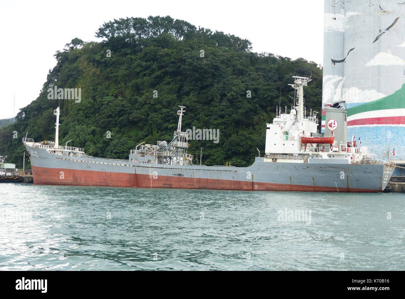 Photograph of the Asia Cement No.1 vessel being loaded at Keelung Port ...