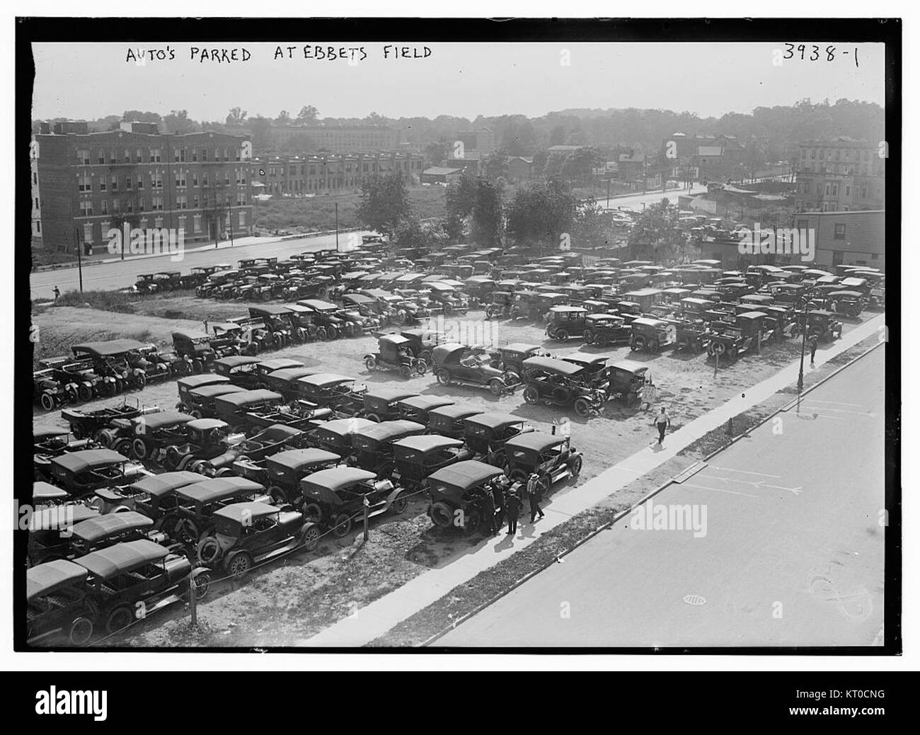 This photograph shows cars parked at Ebbets Field, the former home of ...