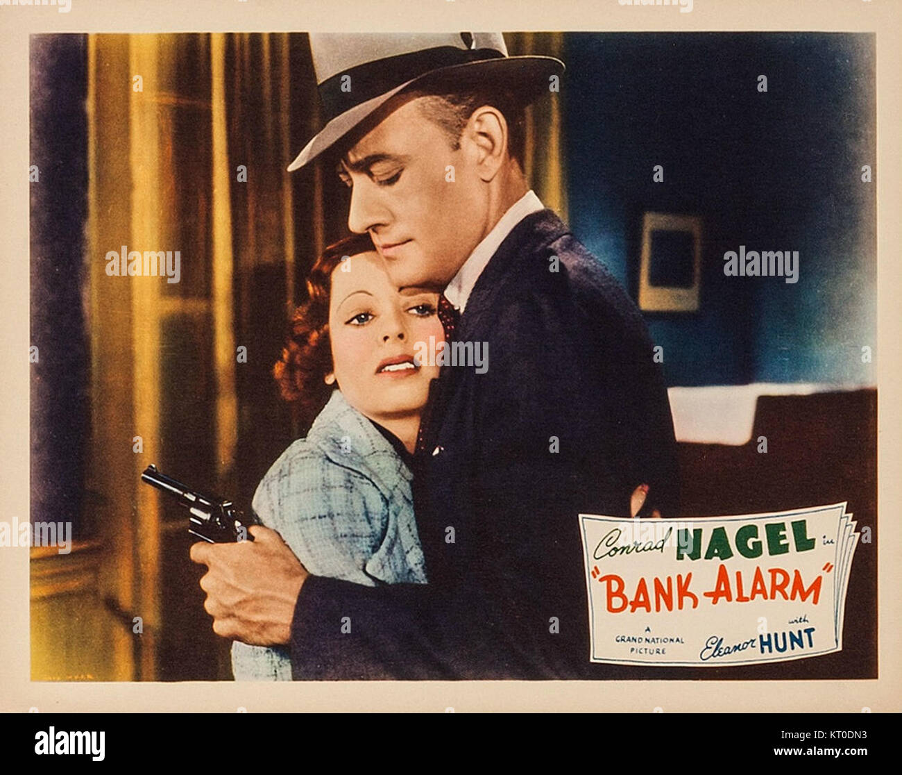 A lobby card featuring a scene from 'Bank Alarm,' a classic film known ...