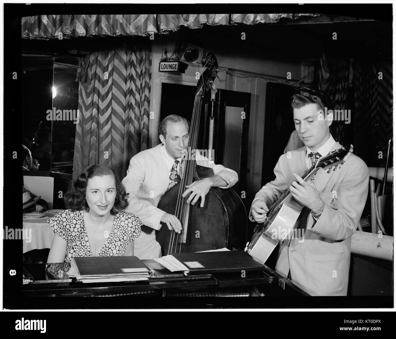 This photograph features jazz musicians Barbara Carroll, Clyde Lombardi ...