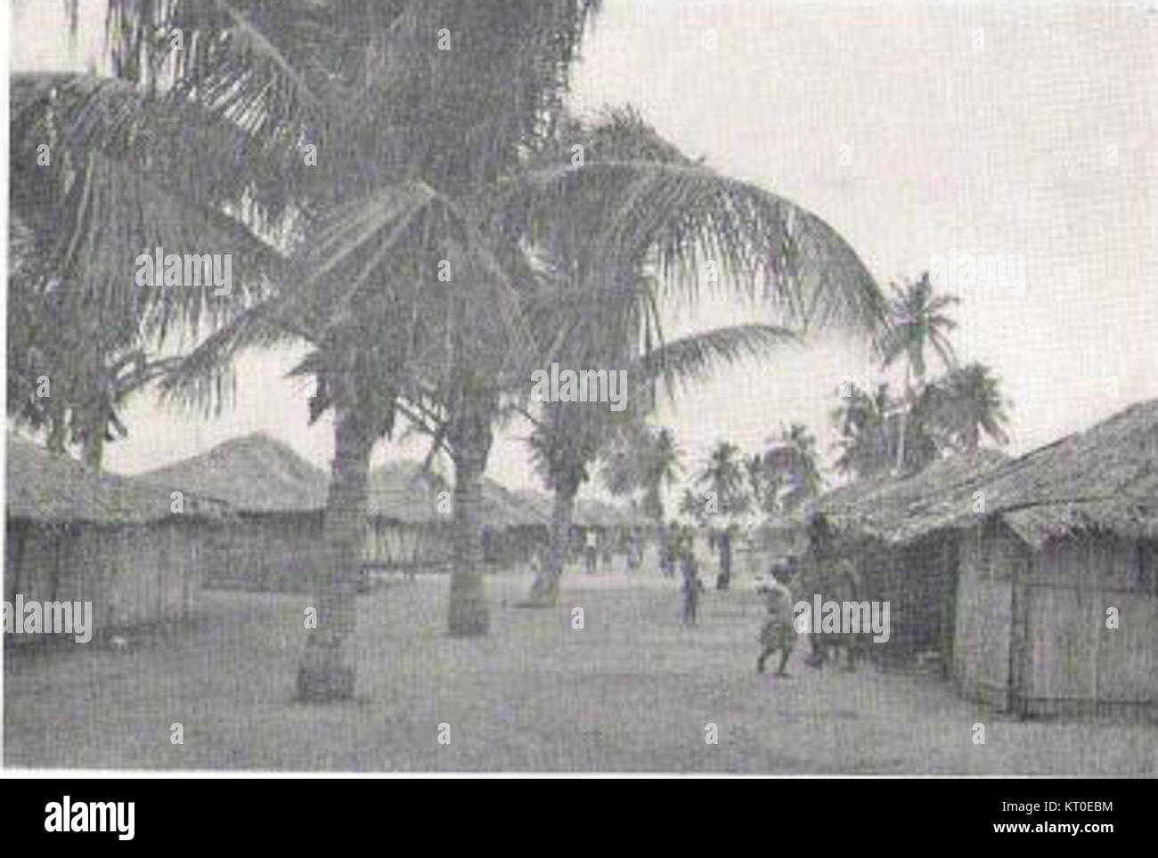 A historical image depicting a native village in the Belgian Congo ...