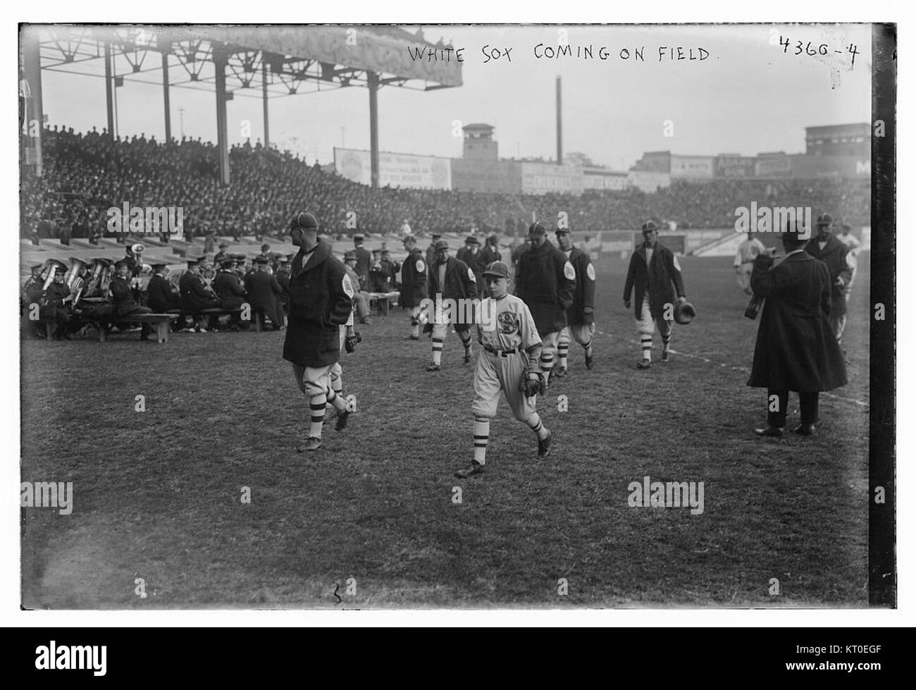 A historic photograph showing the Chicago White Sox entering the field ...
