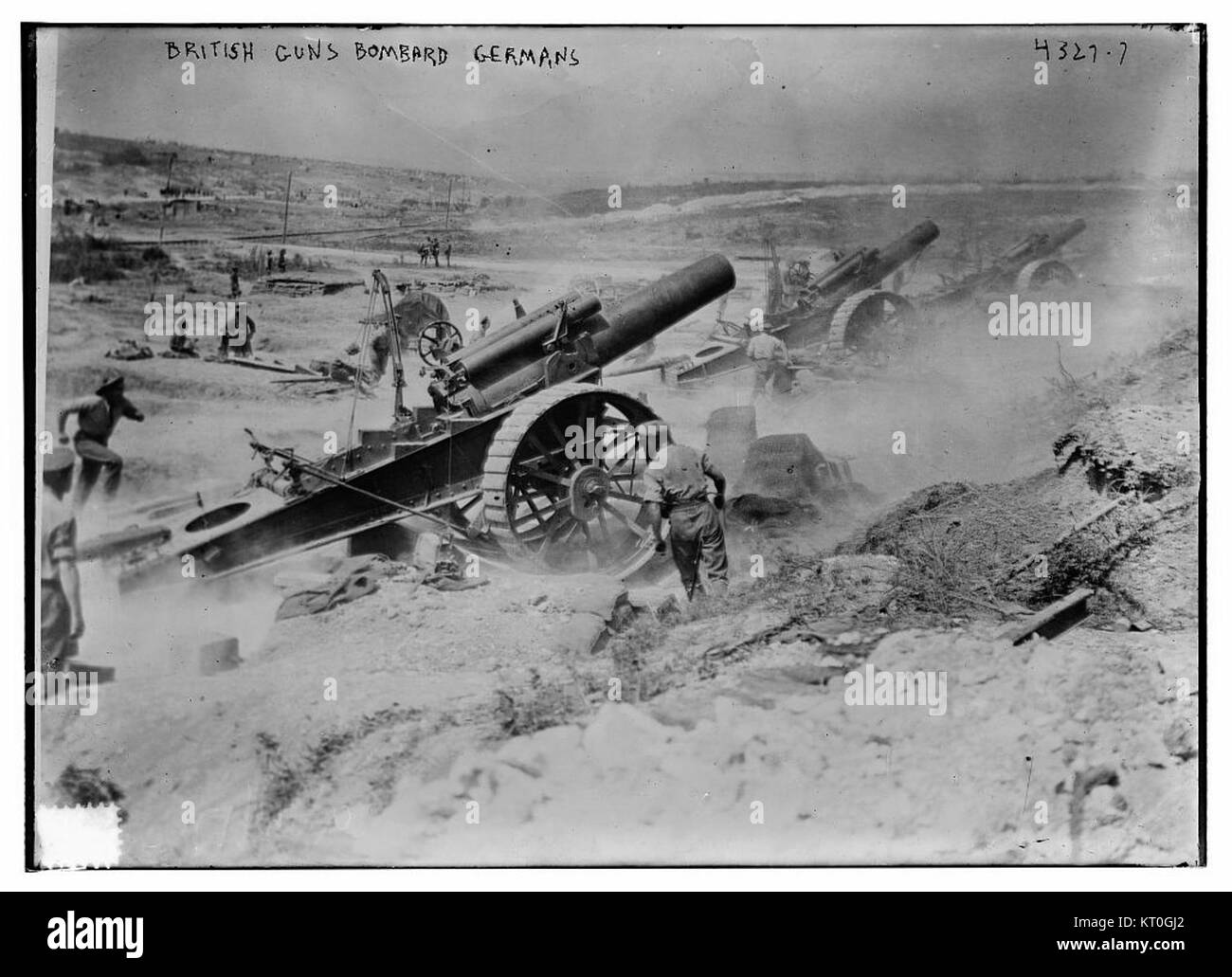 The image depicts British guns bombarding German positions during a ...