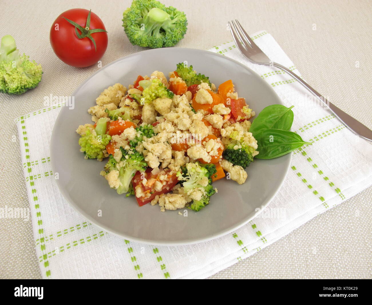 vegetable crumble with carrots,broccoli,tomatoes and parmesan sprinkles ...