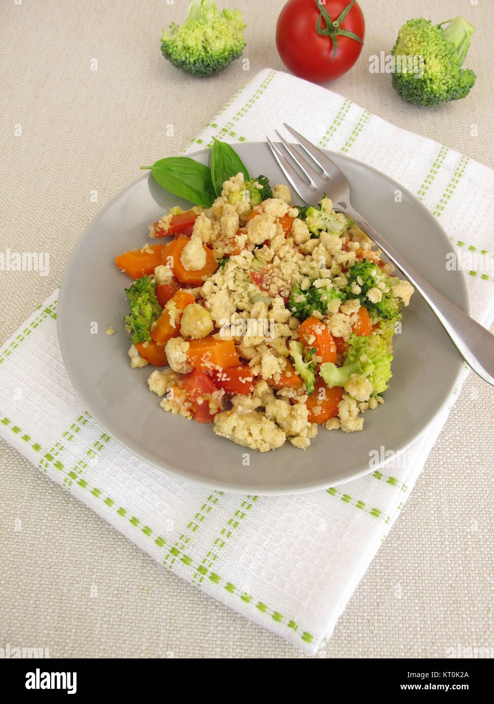 vegetable crumble with carrots,broccoli,tomatoes and parmesan sprinkles ...