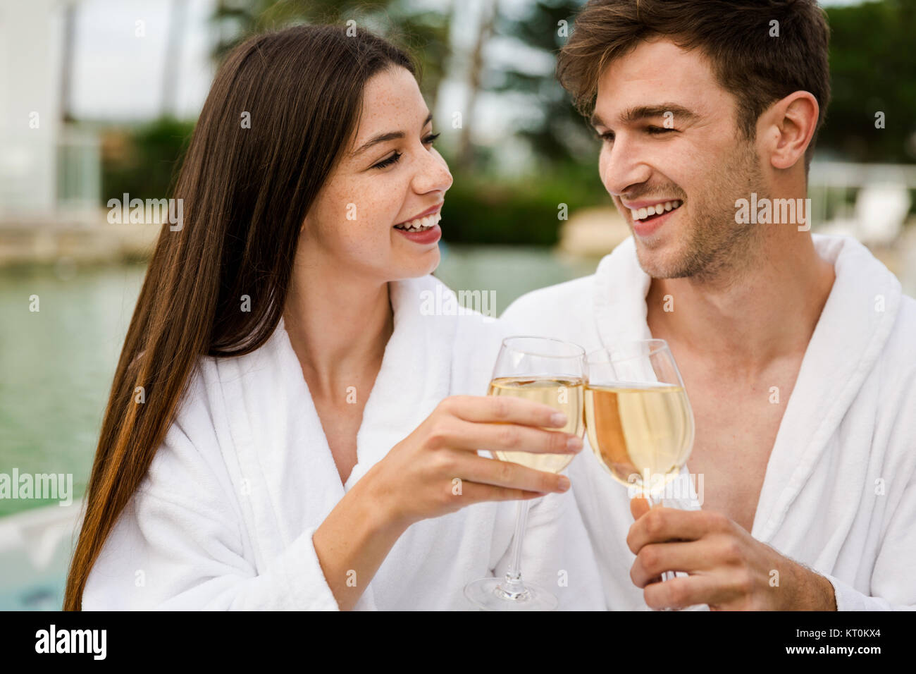 Young couple in a jacuzzi Stock Photo - Alamy