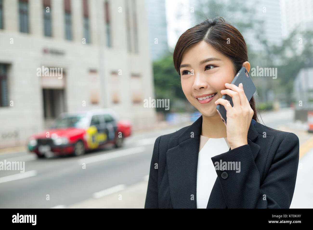 Businesswoman make a call on phone Stock Photo - Alamy