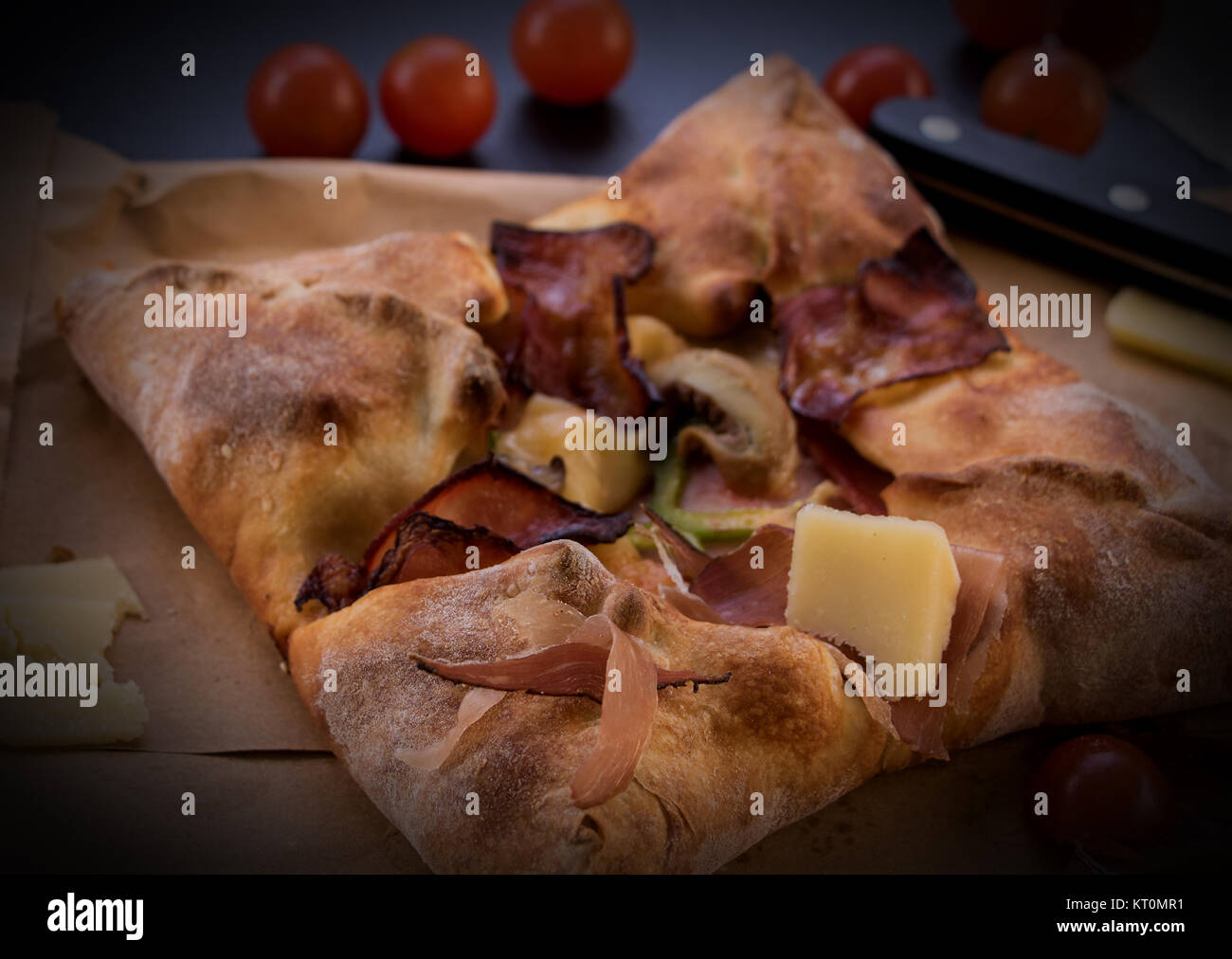 calzone,pizza with filling Stock Photo - Alamy