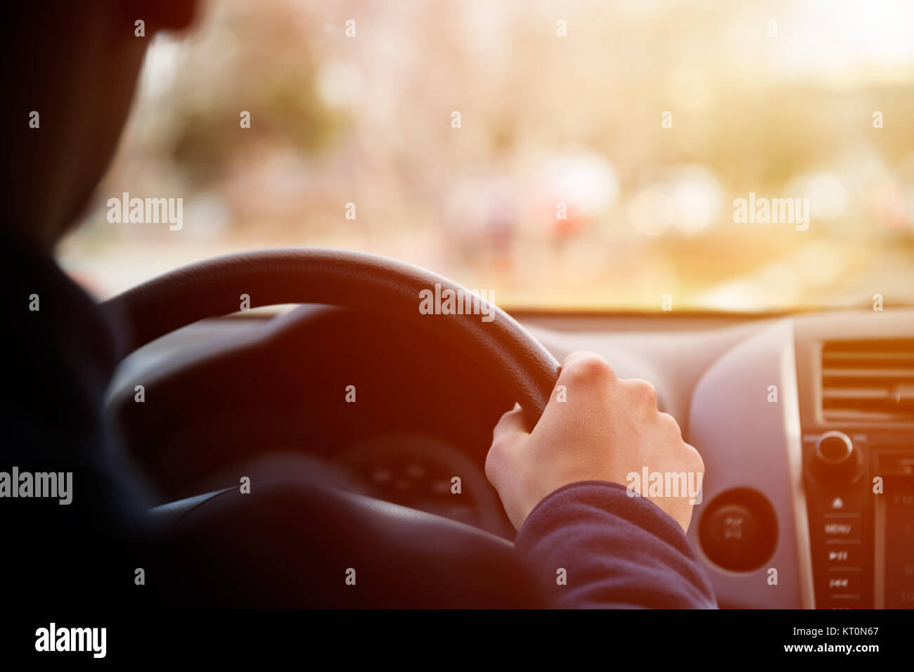 Driving car hands on steering wheel Stock Photo - Alamy