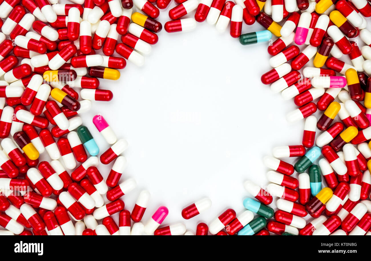 Colorful of antibiotic capsules pills isolated on white background with ...