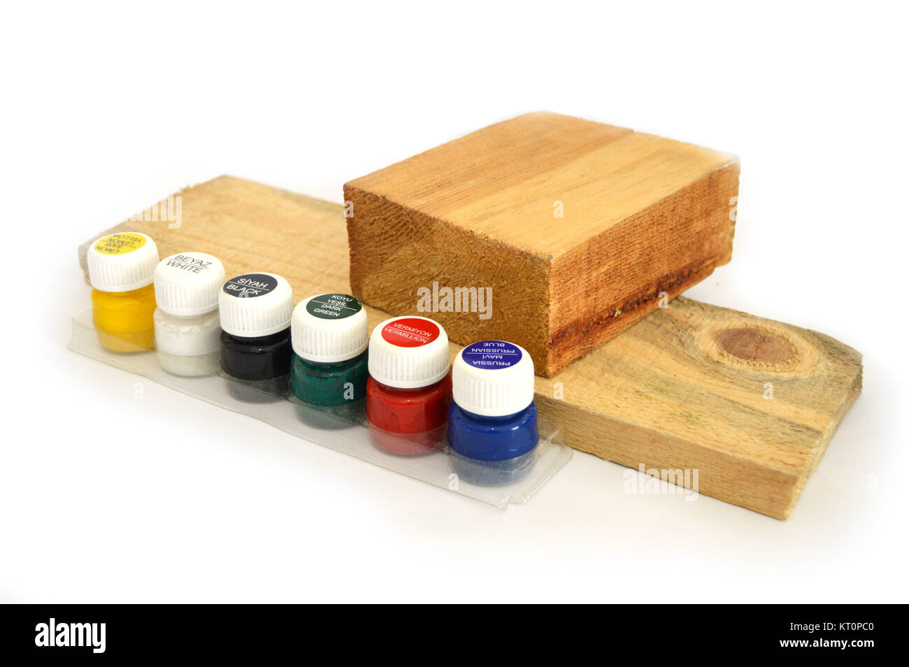 Wood fragments and multi-colored toxic-free wood paints Stock Photo - Alamy