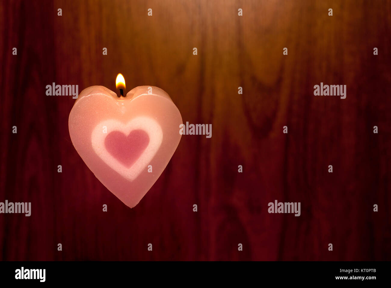 Candles shape heart Stock Photo - Alamy