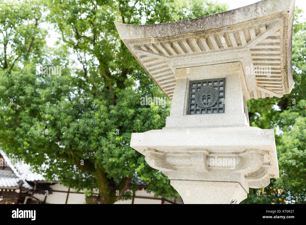 Stone lantern in Japanese garden Stock Photo - Alamy