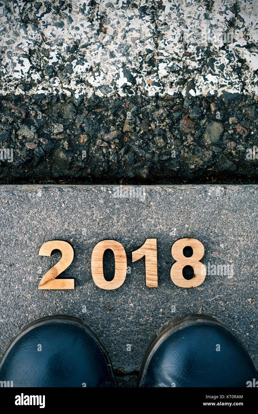 high angle view of four wooden numbers forming the number 2017 as the ...