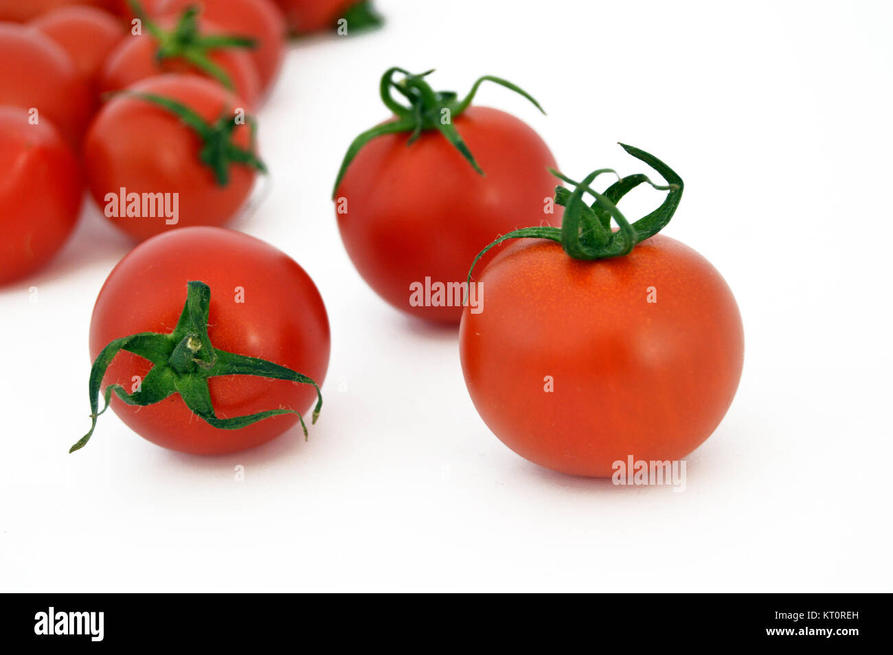 Tiny cherry tomatoes Stock Photo - Alamy