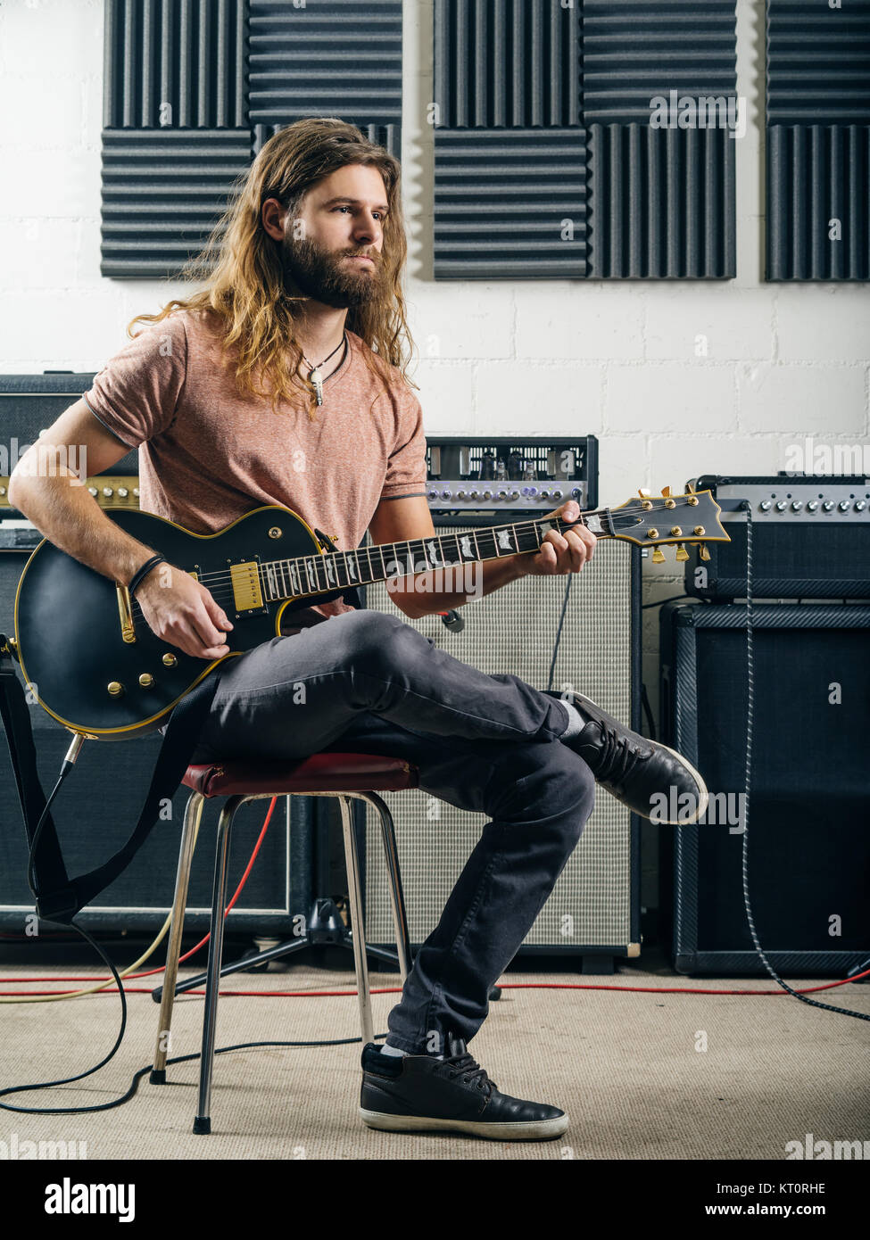 Guitarist playing in the recording studio Stock Photo - Alamy