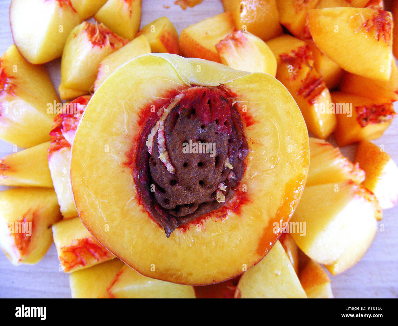 Peach and peach seeds Stock Photo - Alamy