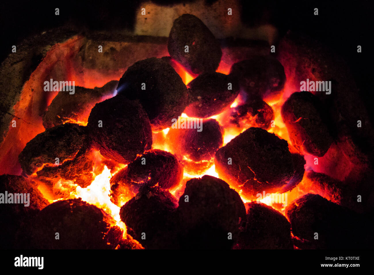 Burning Coke Coals on a Fireplace Stock Photo - Alamy