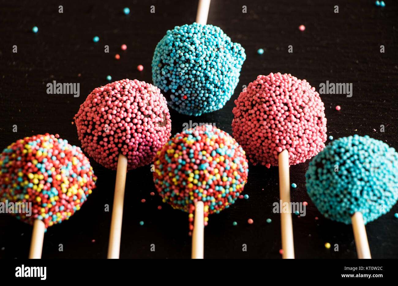 six colorful chocolate pops Stock Photo - Alamy